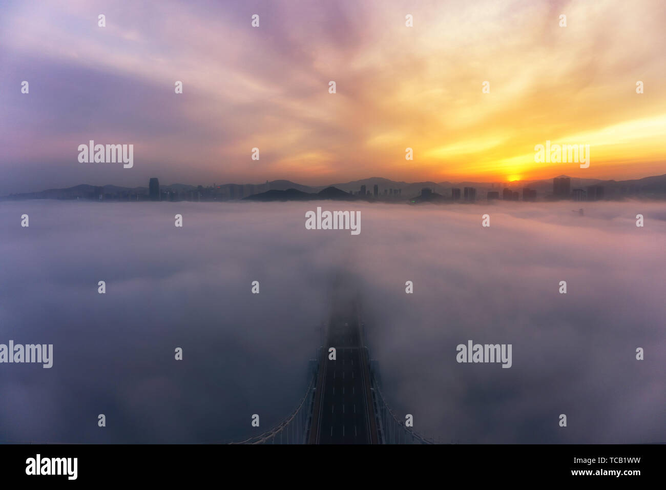 Flow fog of Dalian Xingwan Bridge Stock Photo - Alamy