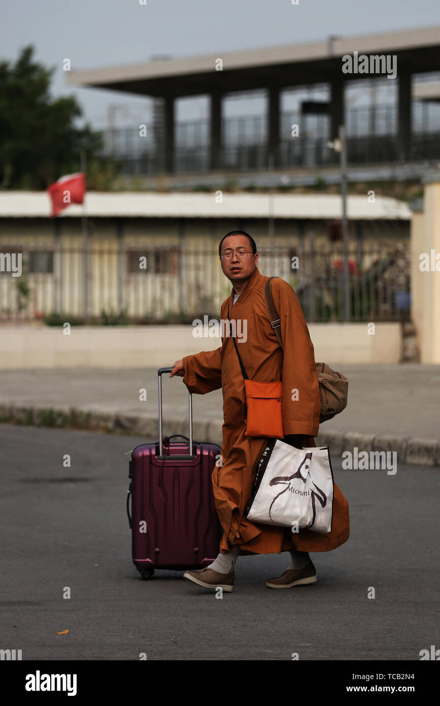 High-speed rail passenger, a monk Stock Photo - Alamy