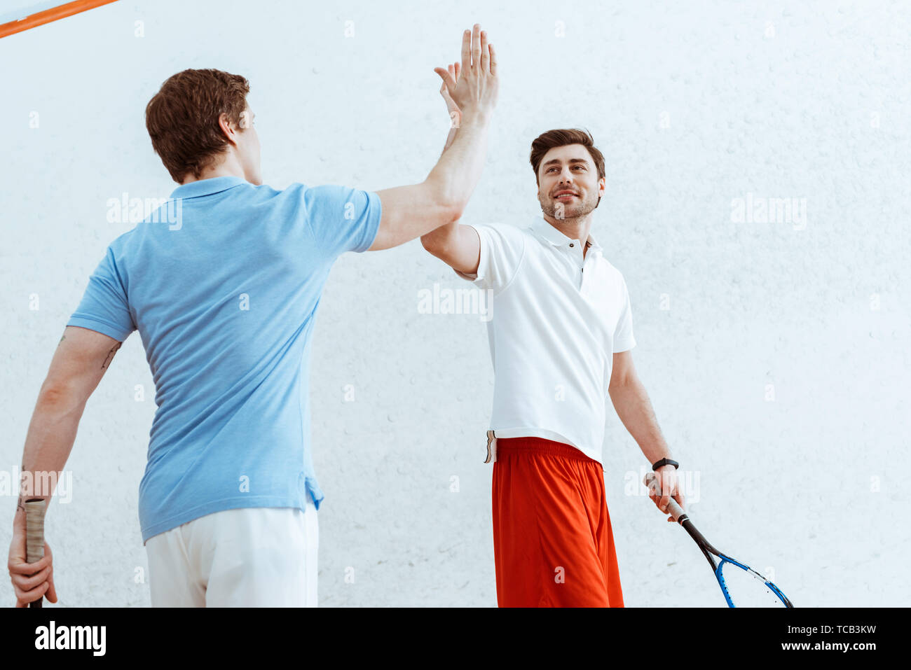 Exercising together high five hi-res stock photography and images - Alamy