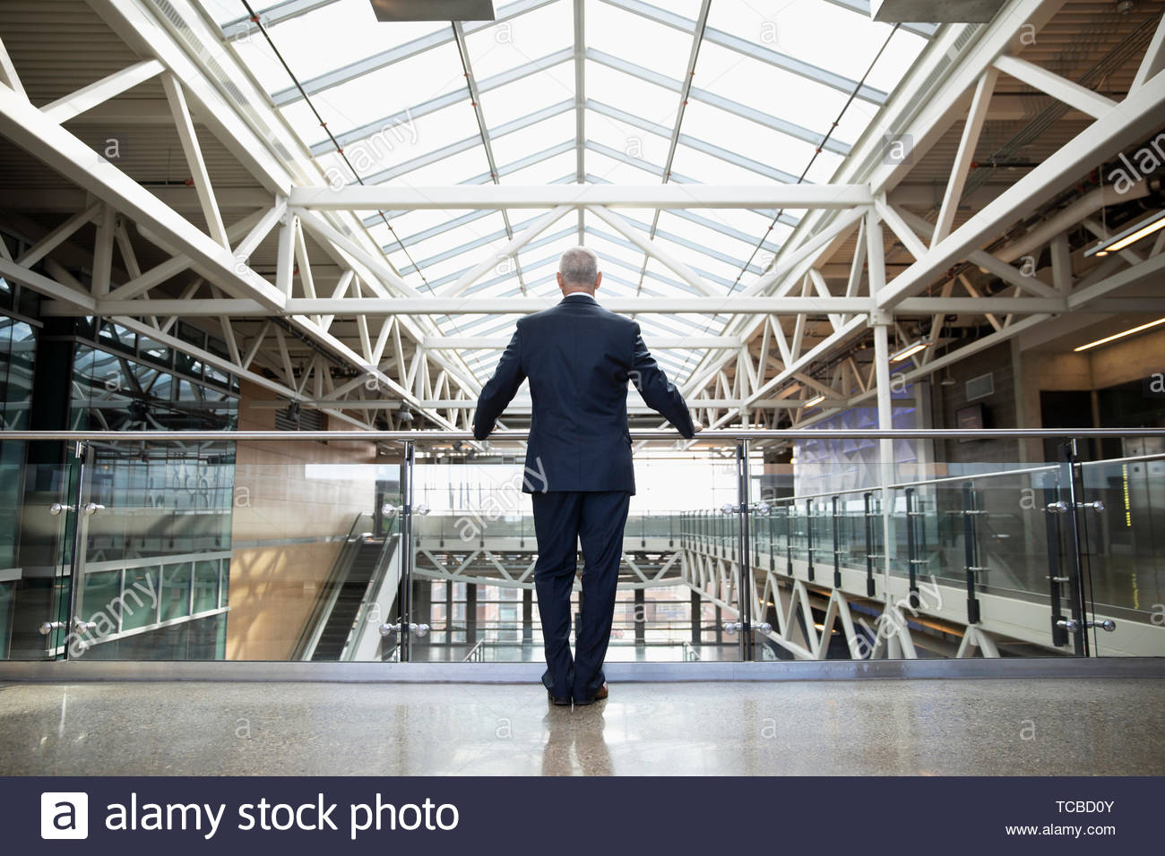 Businessman leaning balcony railing hi-res stock photography and images ...