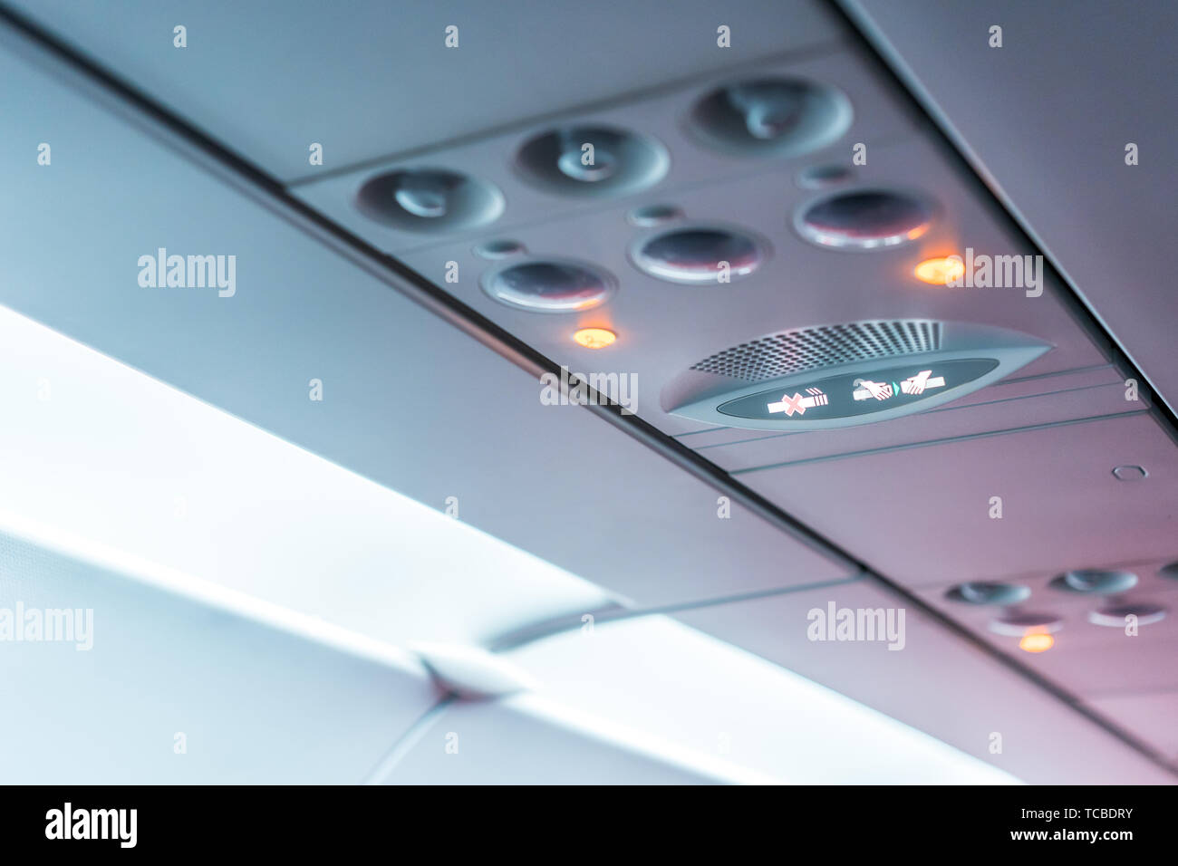closeup airplane Console panel; lamp, light, need help button, air ...