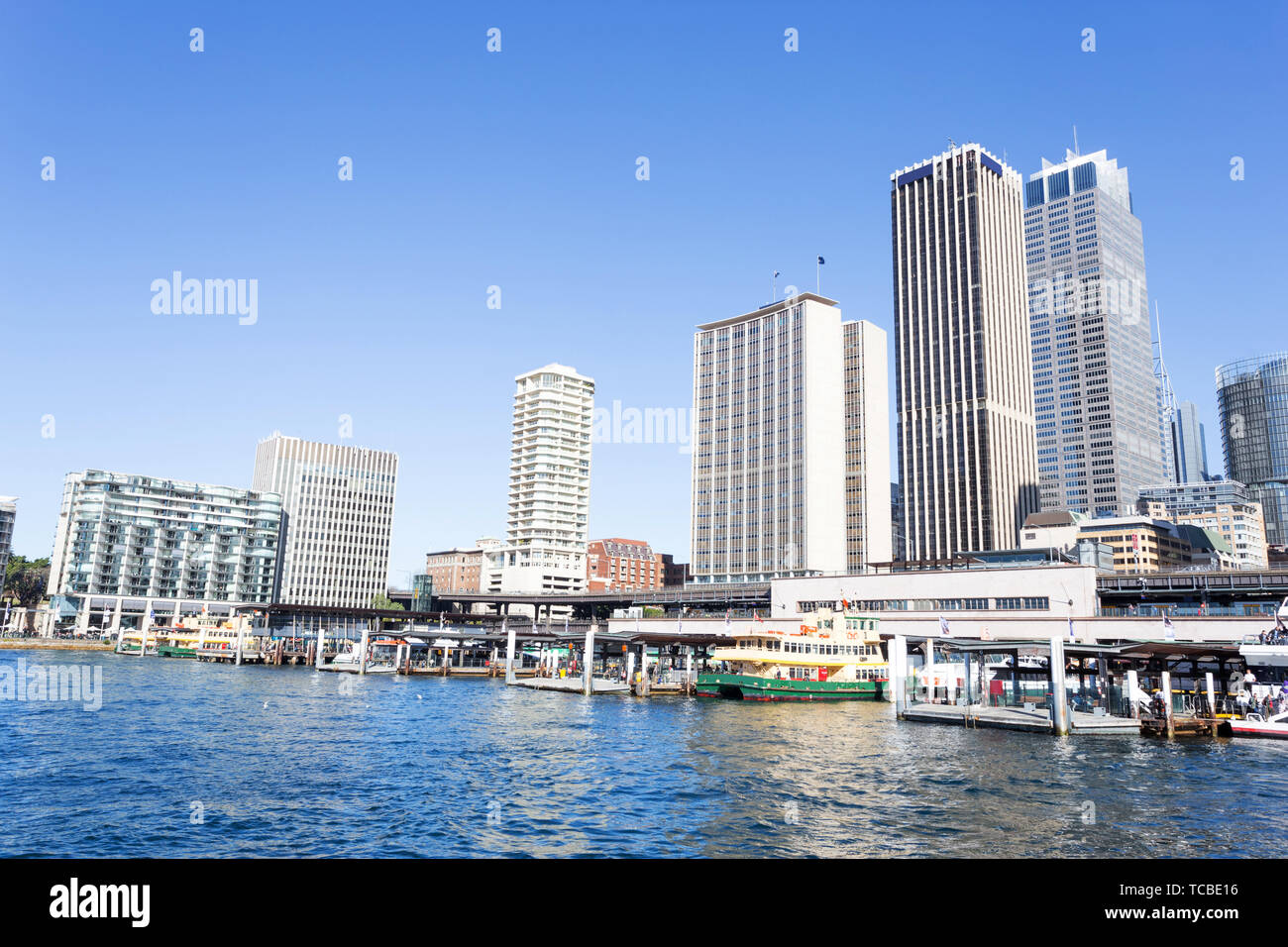 Skyline and office building at seashore Stock Photo - Alamy