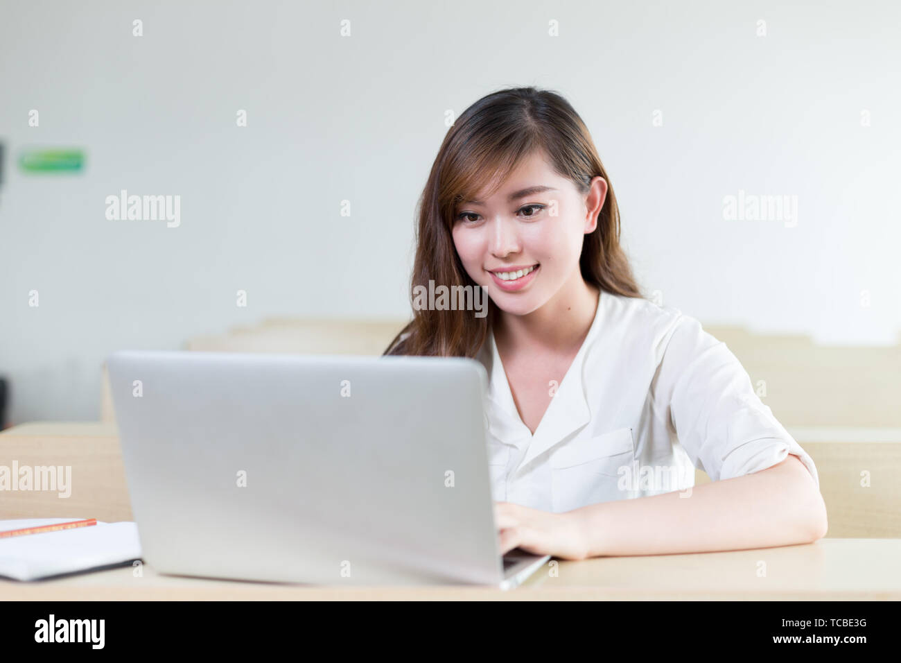 Asian beautiful female student study with laptop in classroom Stock ...
