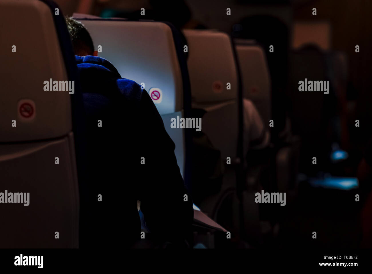 Inflight reading hi-res stock photography and images - Alamy