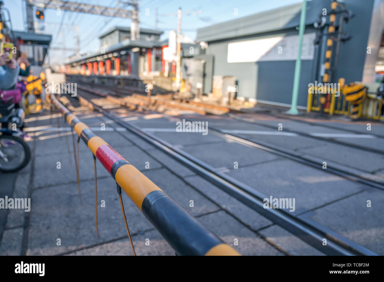 local japanese railroad tracks with home and car parking beside Stock ...