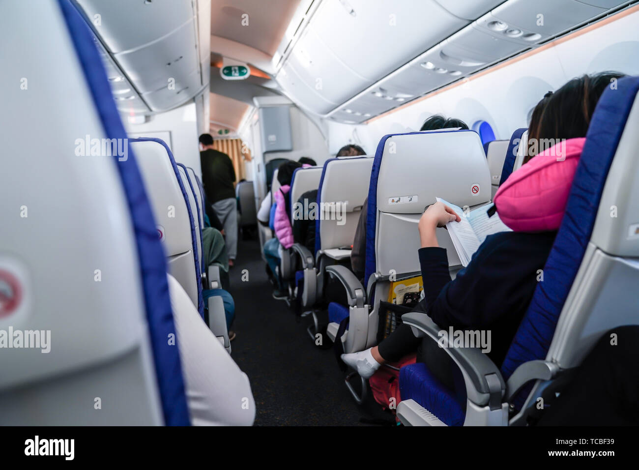 Woman read book plane hi-res stock photography and images - Alamy