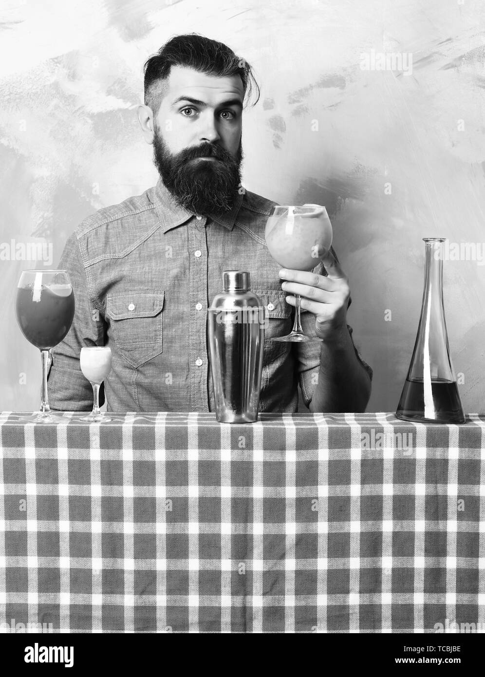 Man in blue checkered Black and White Stock Photos & Images - Alamy