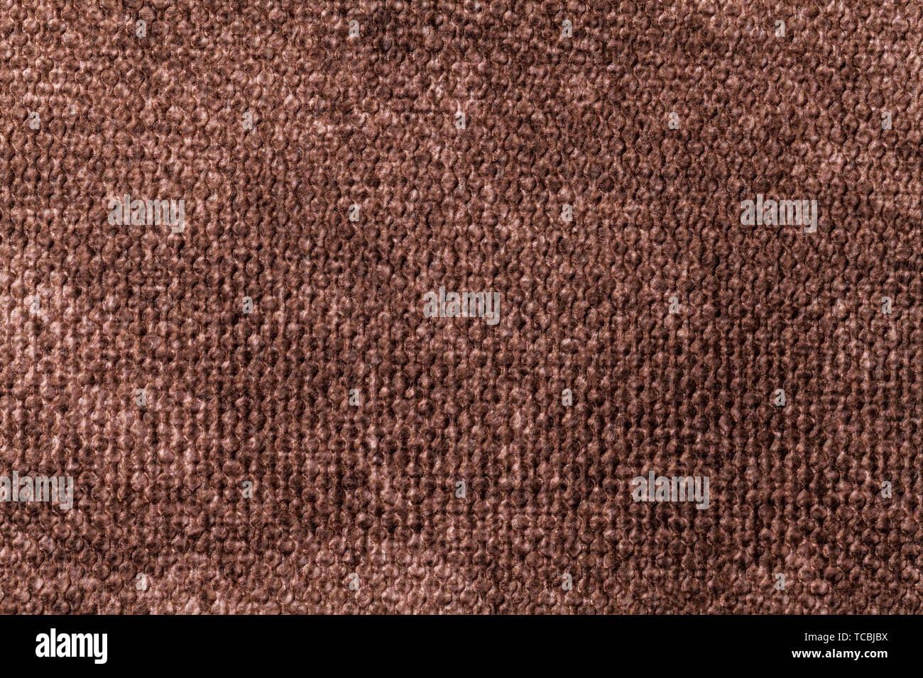 Dark brown background from a soft textile material. sheathing fabric ...