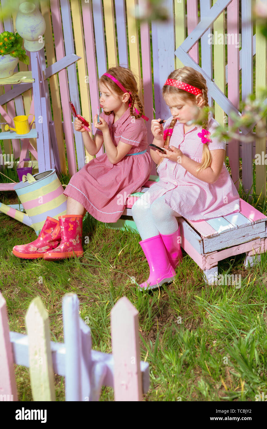 Little child play lipstick hi-res stock photography and images - Alamy