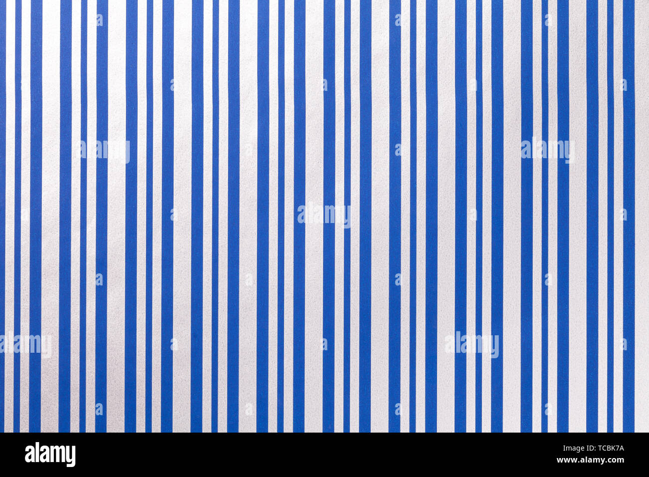 Navy blue and white background from wrapping paper with a pattern of ...