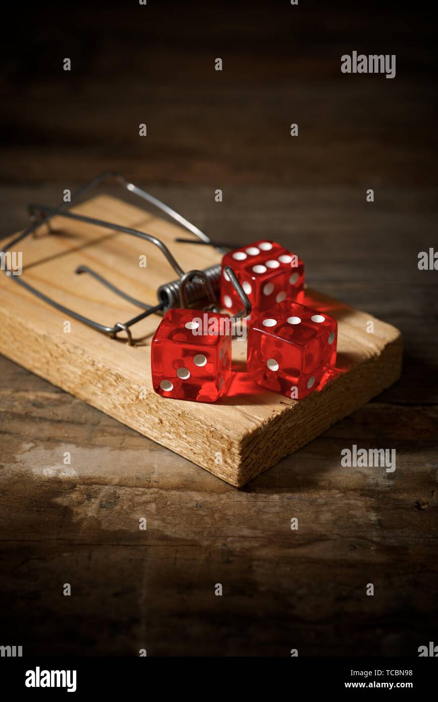 Red dice mousetrap gambling trap hi-res stock photography and images ...