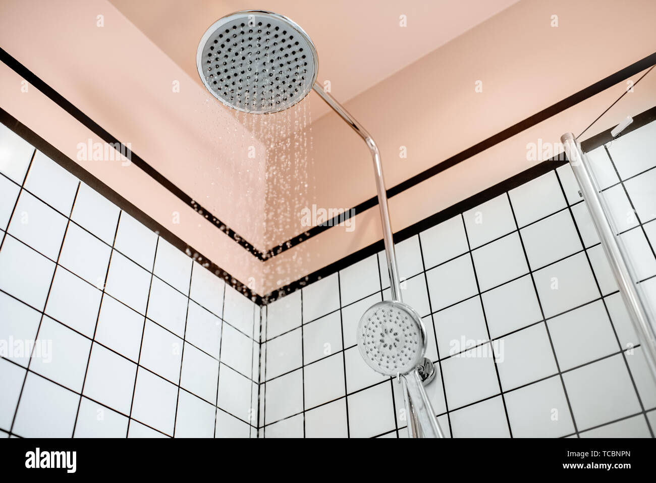 Shower with falling drops of water in the bathroom Stock Photo - Alamy