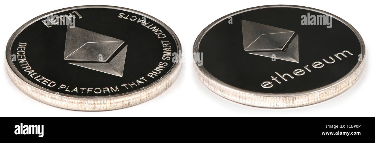 Golden ethereum isolated on white background. Front and back sides are ...