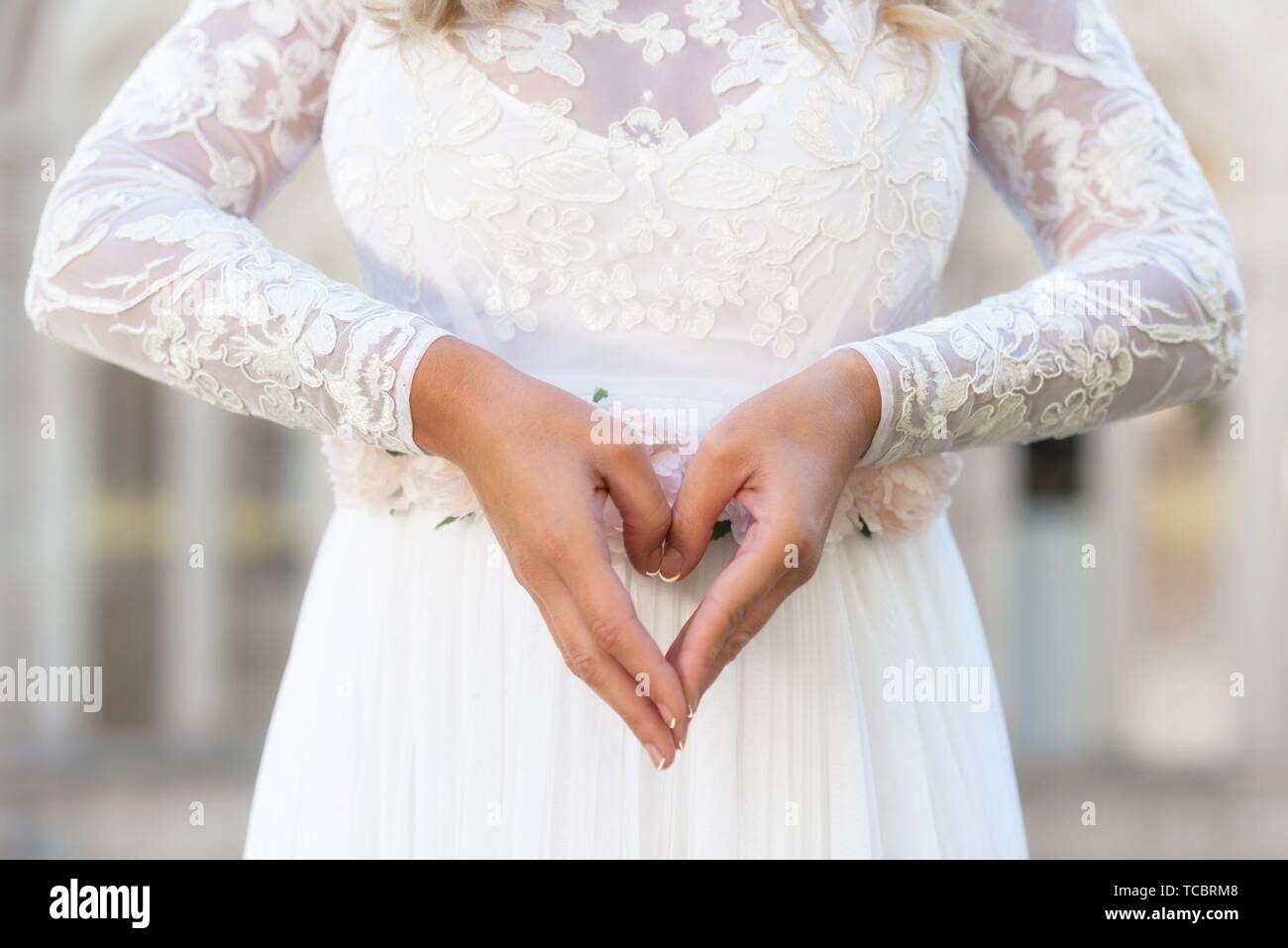 Young married couple making heart hi-res stock photography and images ...