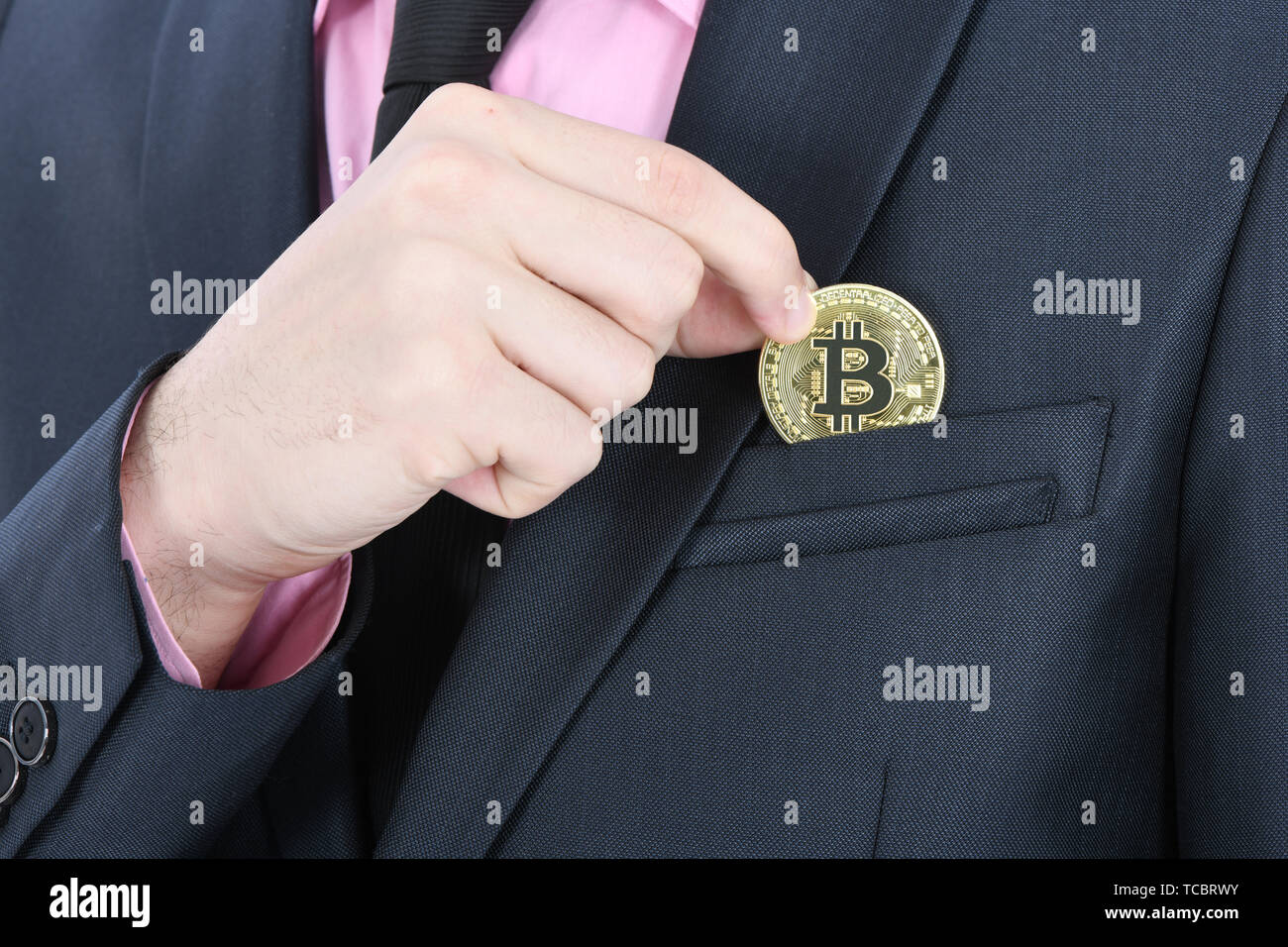 Man's hand holding golden Bitcoin isolated on white background. High ...