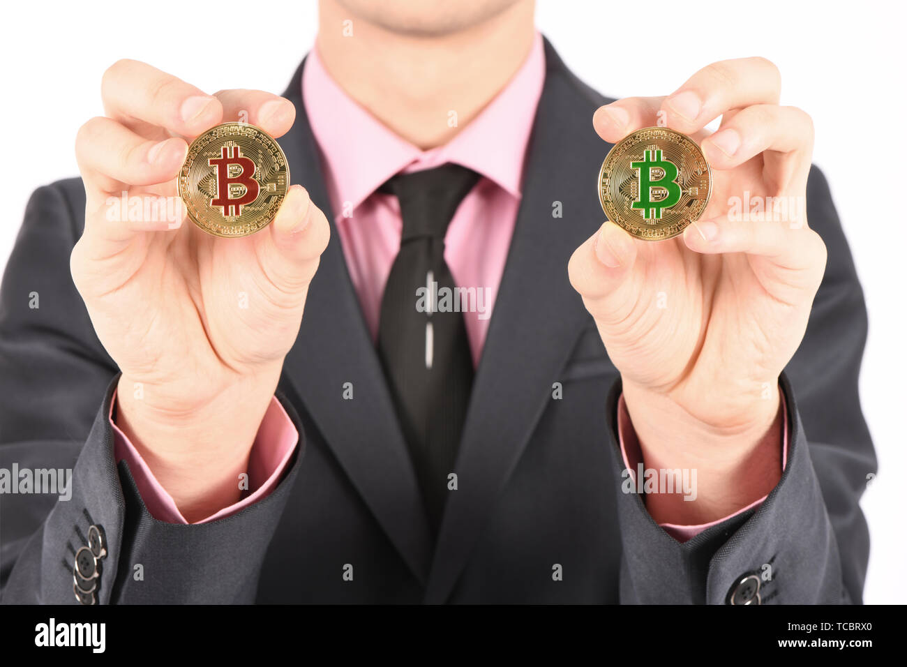 Man holding golden Bitcoin isolated on white background. High ...