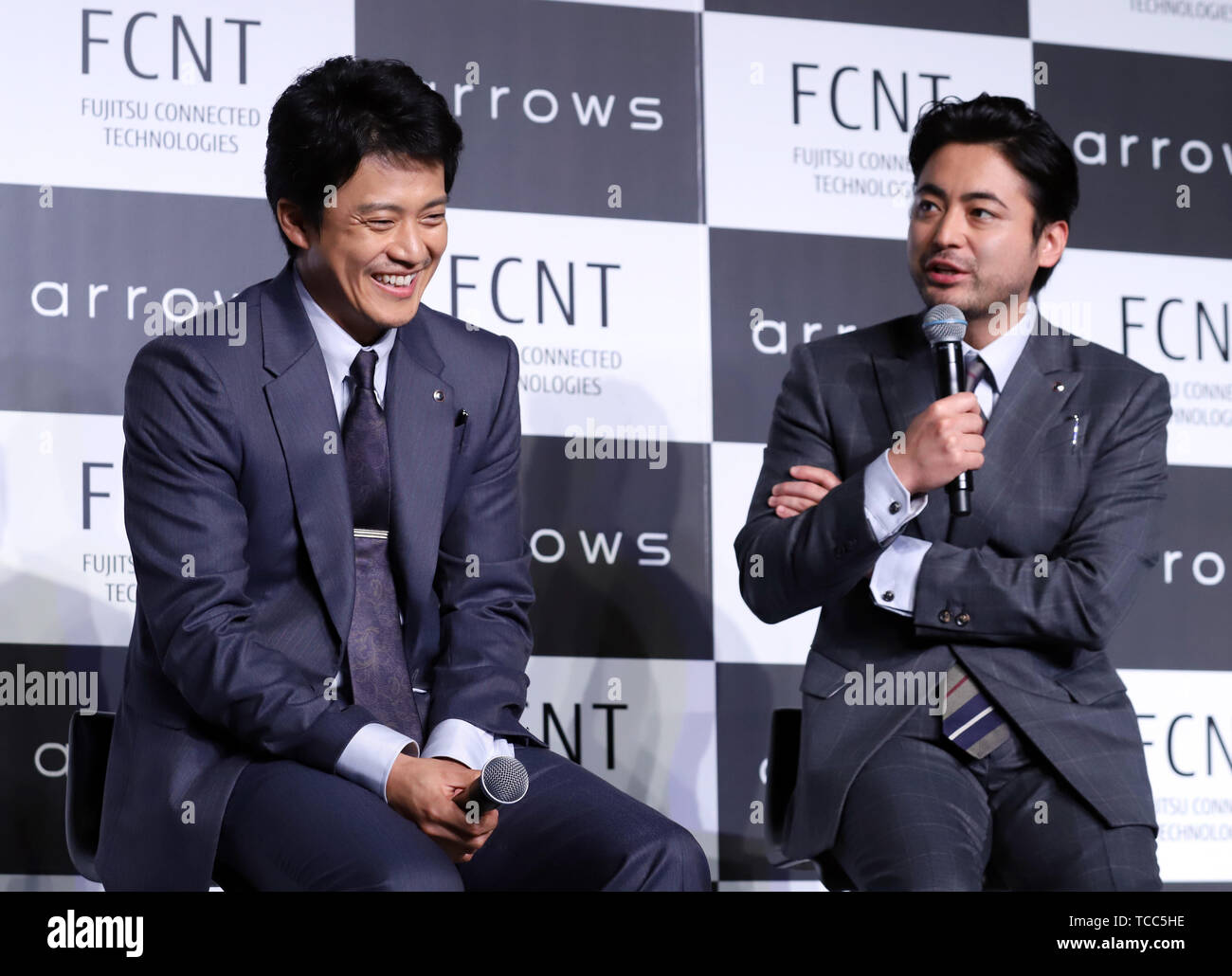 Tokyo, Japan. 7th June, 2019. Japanese actors Shun Oguri (L) and ...
