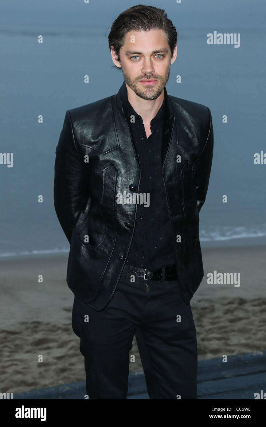 MALIBU, LOS ANGELES, CALIFORNIA, USA - JUNE 06: Actor Tom Payne arrives ...
