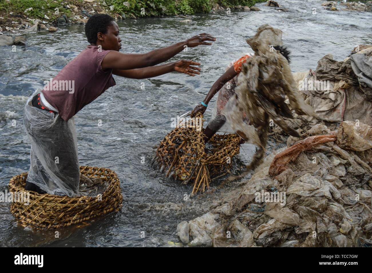 Nairobi, Kenya. 13th Sep, 2018. Women seen washing sheets of plastic in ...