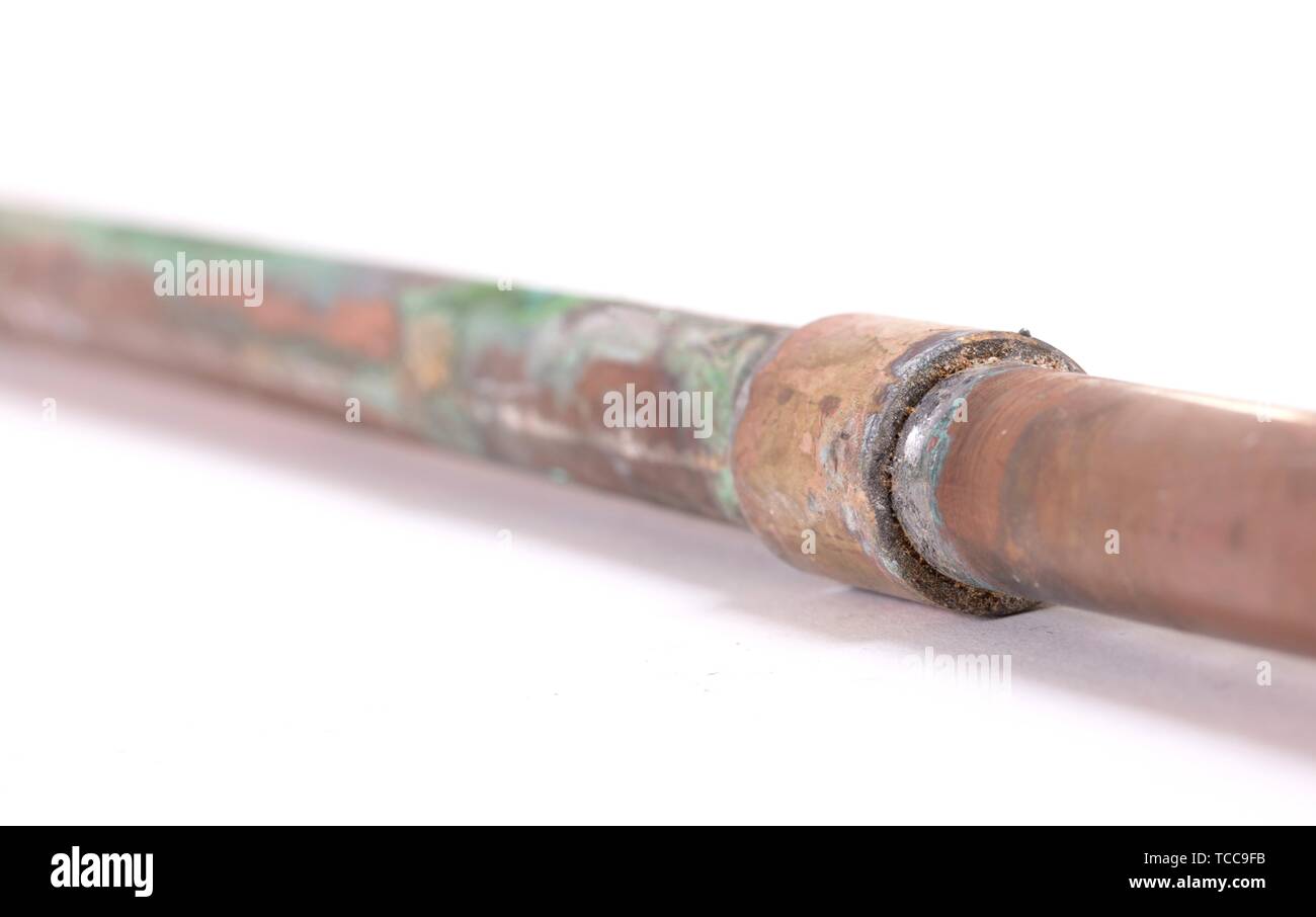 Old brass pipe, isolated on a white background Stock Photo - Alamy