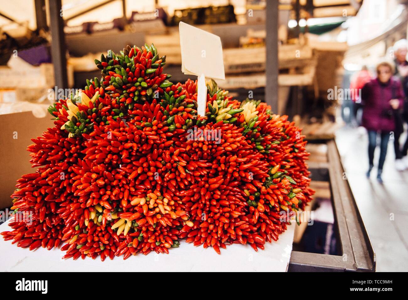 a bunch of crispy chili peppers on the market Stock Photo - Alamy
