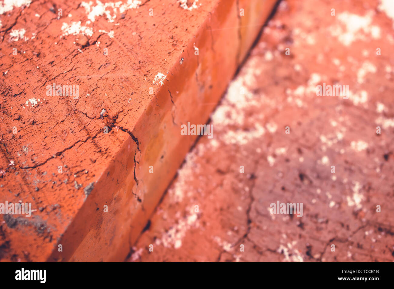 Red ceramic bricks under snow Stock Photo - Alamy