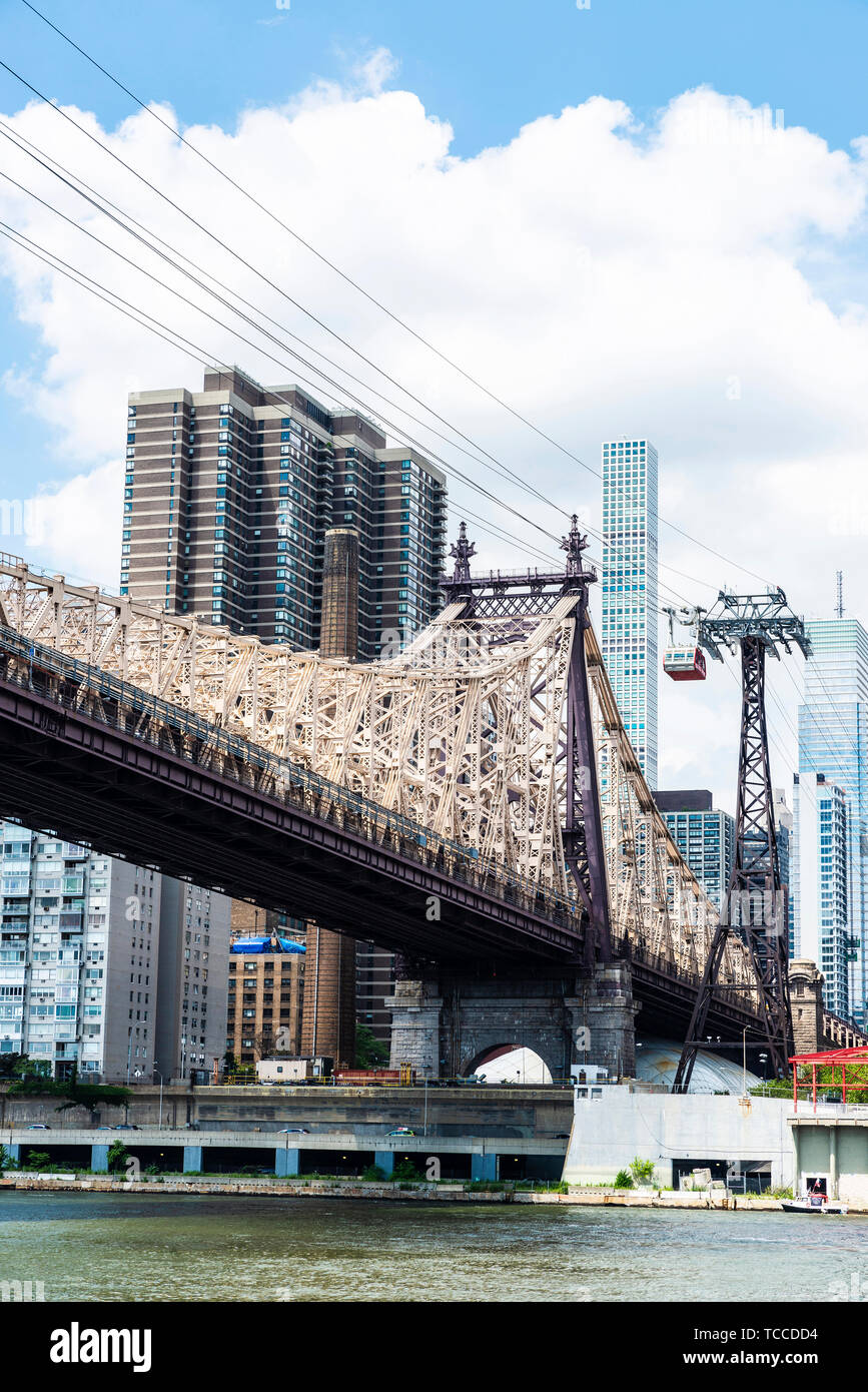 Low angle view of the Ed Koch Queensboro Bridge and an aerial tramway ...