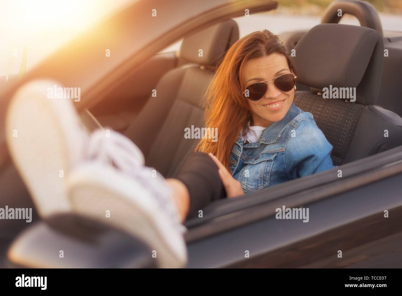 Car at sunset hi-res stock photography and images - Alamy