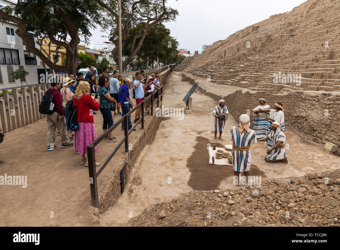 Tourists on a guided tour of Huaca Pucllana, pre Columbian, pre Inca ...