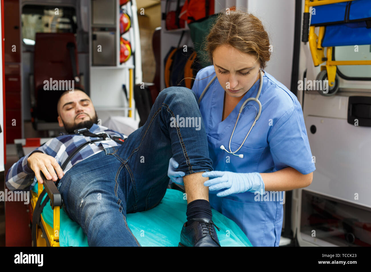 Female paramedic providing first hi-res stock photography and images ...