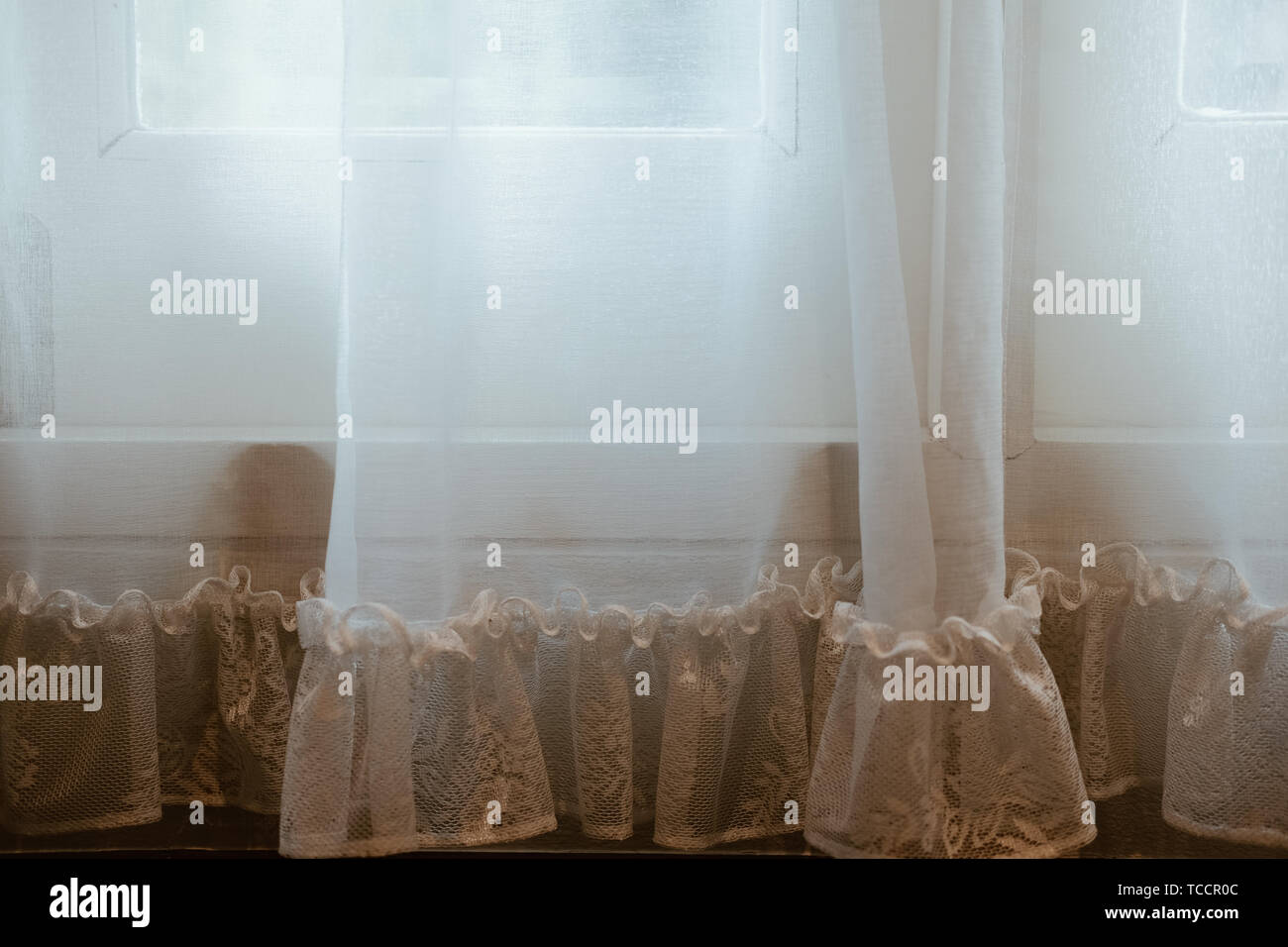 white see through window curtain in house home Stock Photo - Alamy