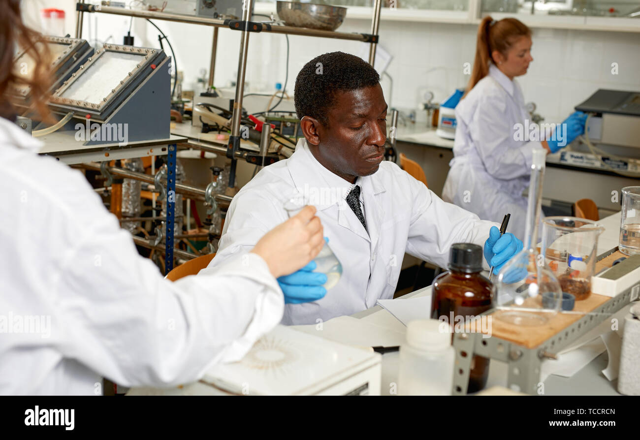 Man woman scientists writing hi-res stock photography and images - Alamy