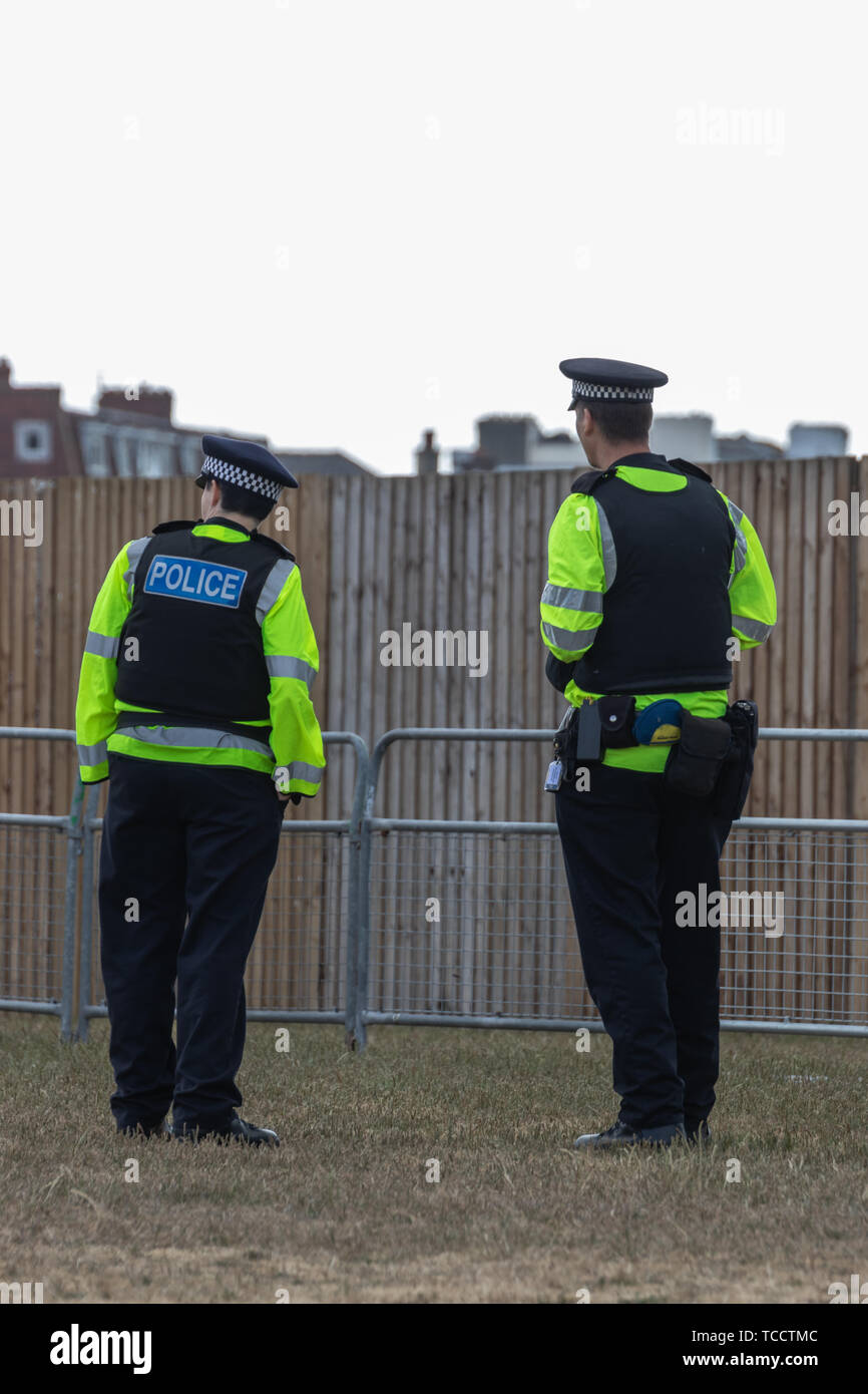 British police officers policing and outdoor event Stock Photo - Alamy