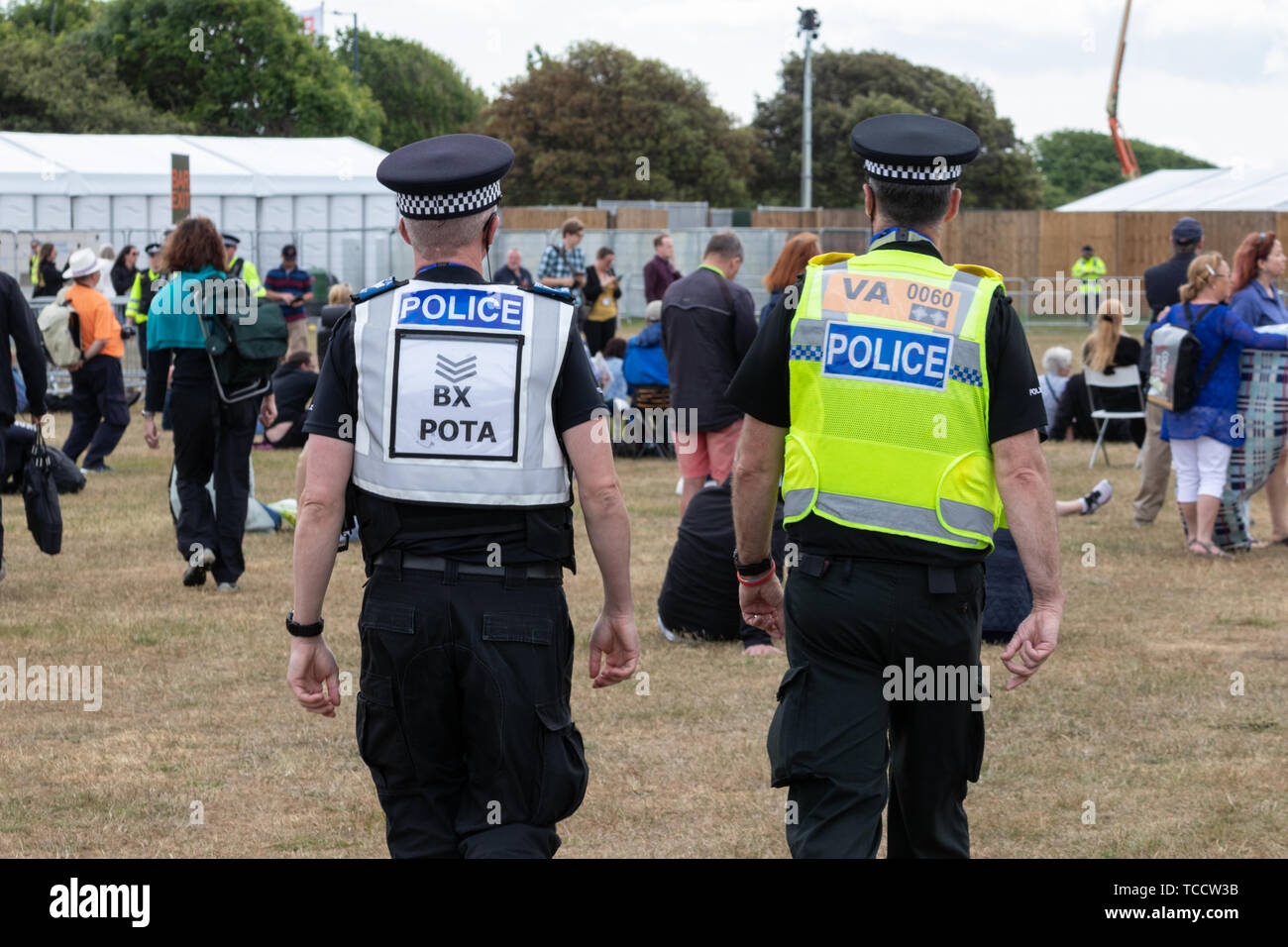 British police officers policing and outdoor event Stock Photo - Alamy