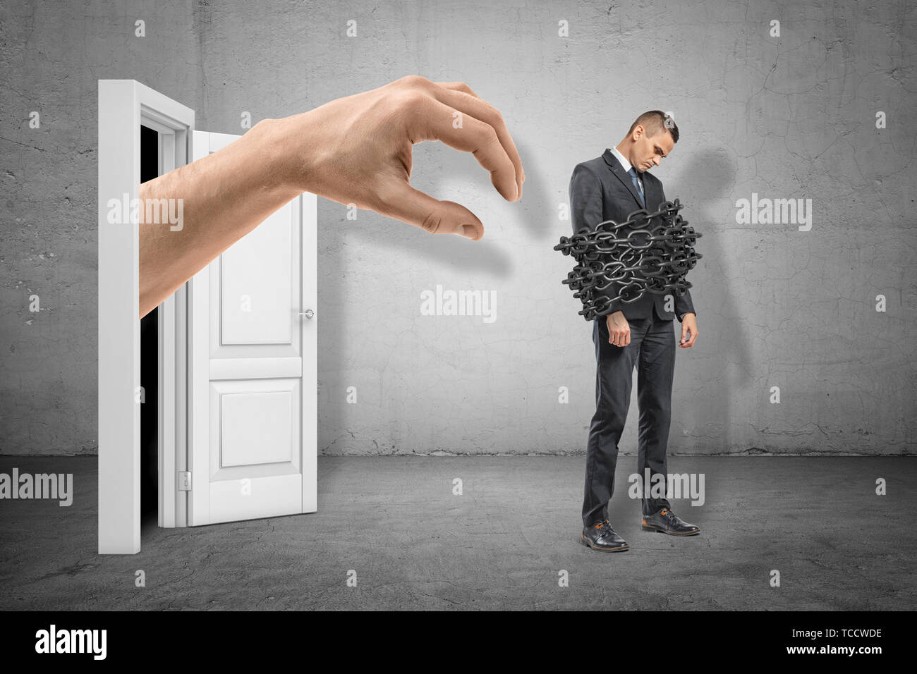 Full length side view of sad little businessman standing with chains ...