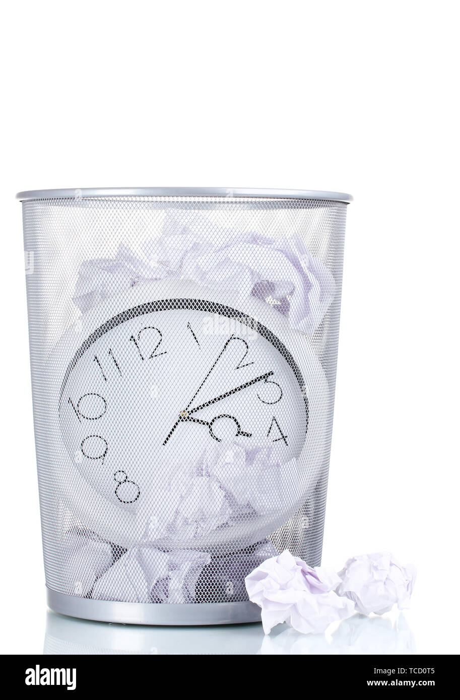 Wall Clock in metal trash bin and paper isolated on white Stock Photo ...