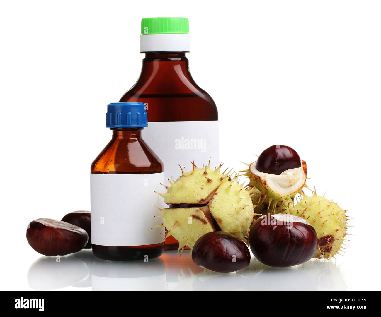 green and brown chestnuts and medical bottles isolated on white Stock ...