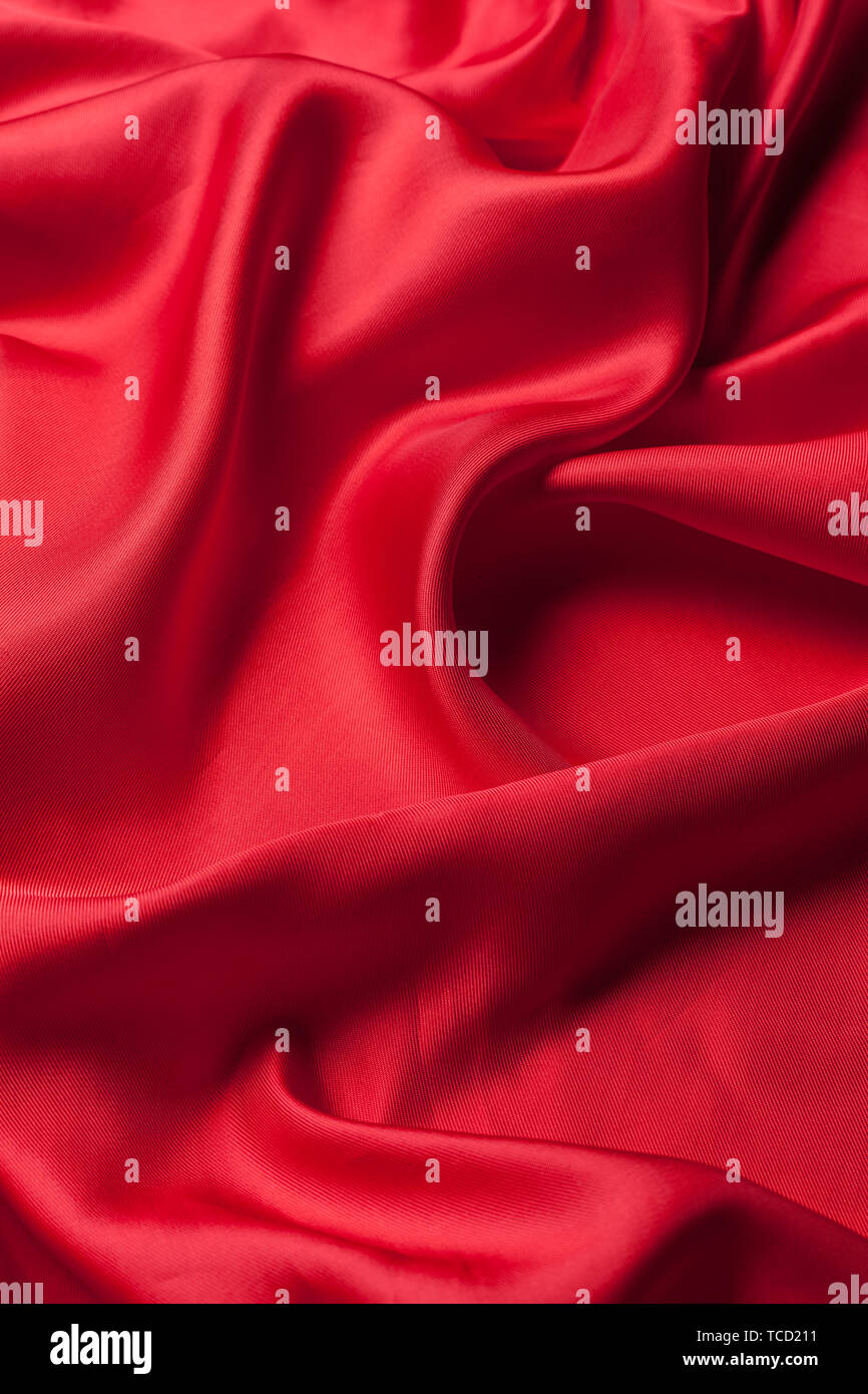 Red cloth waves background texture Stock Photo - Alamy