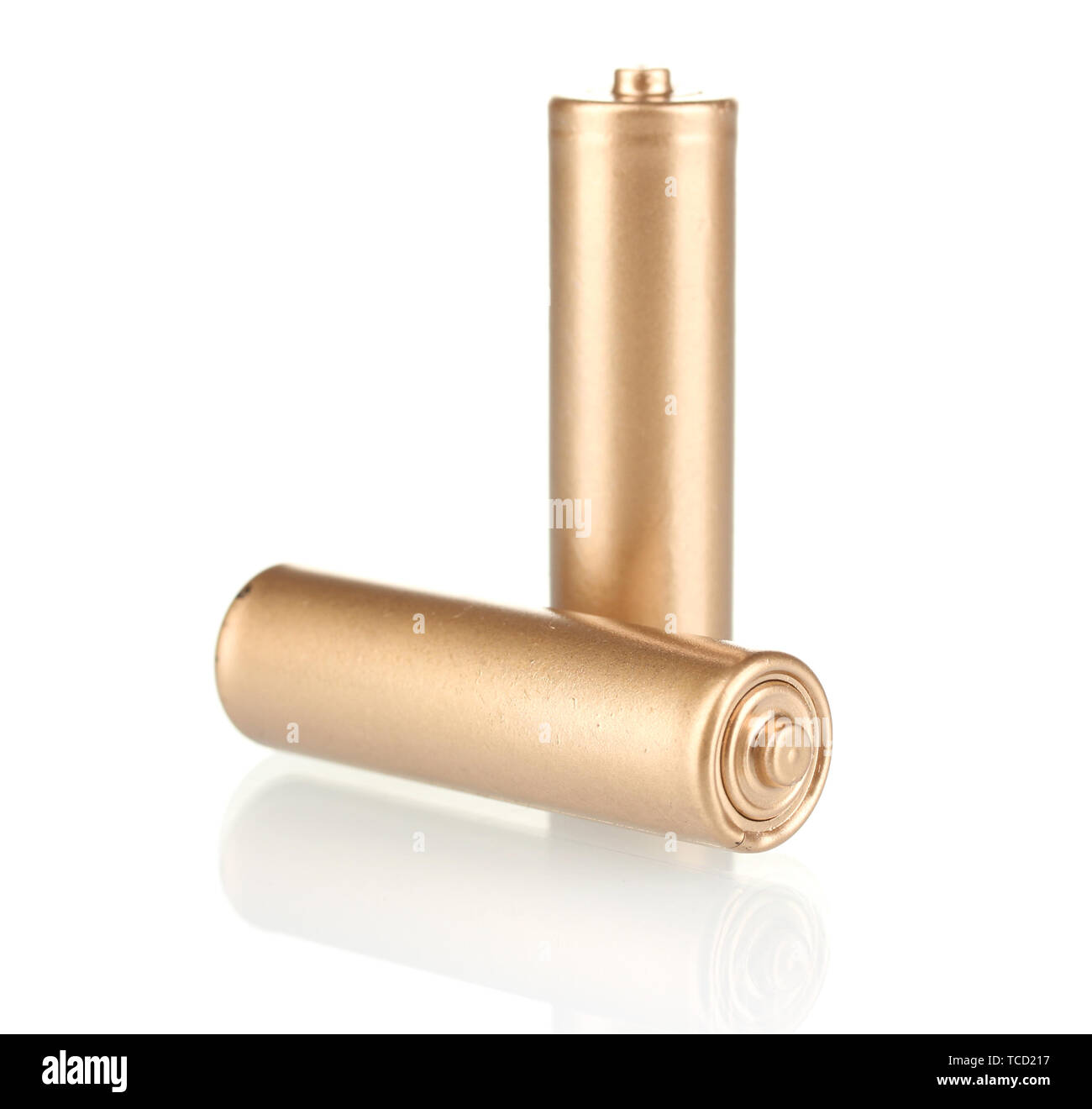 two golden batteries isolated on white Stock Photo - Alamy