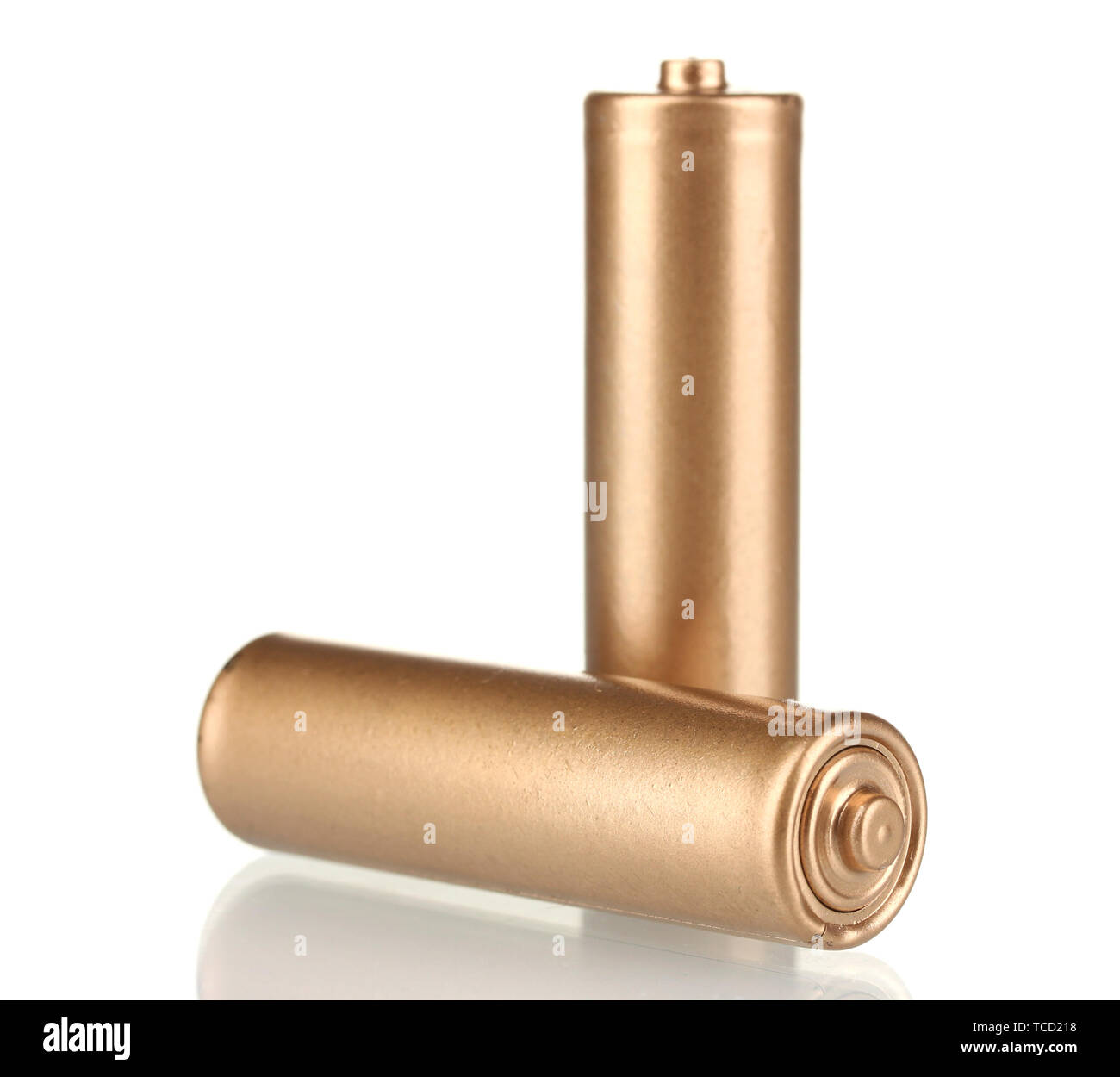 two golden batteries isolated on white Stock Photo - Alamy