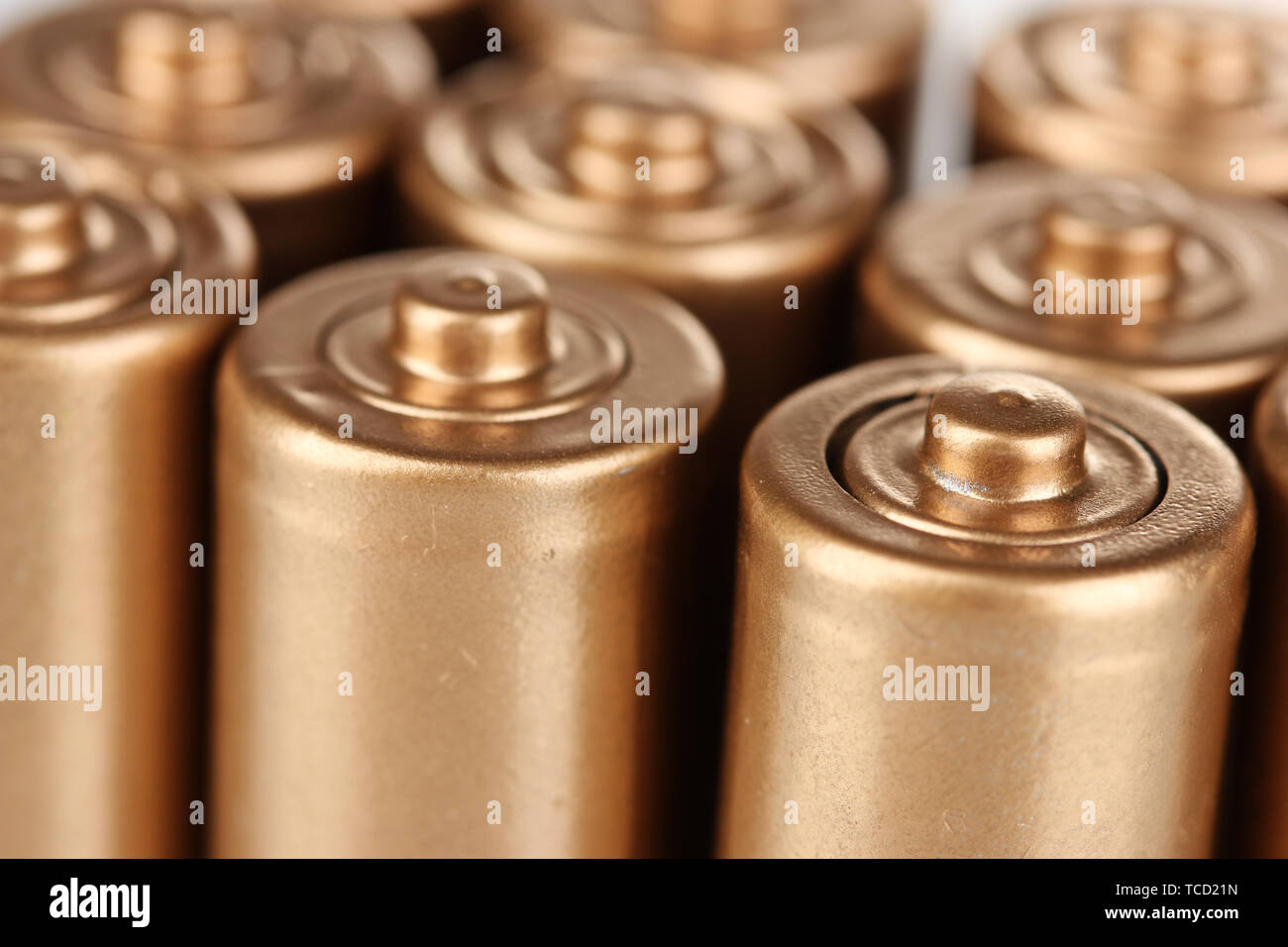 golden batteries closeup Stock Photo - Alamy