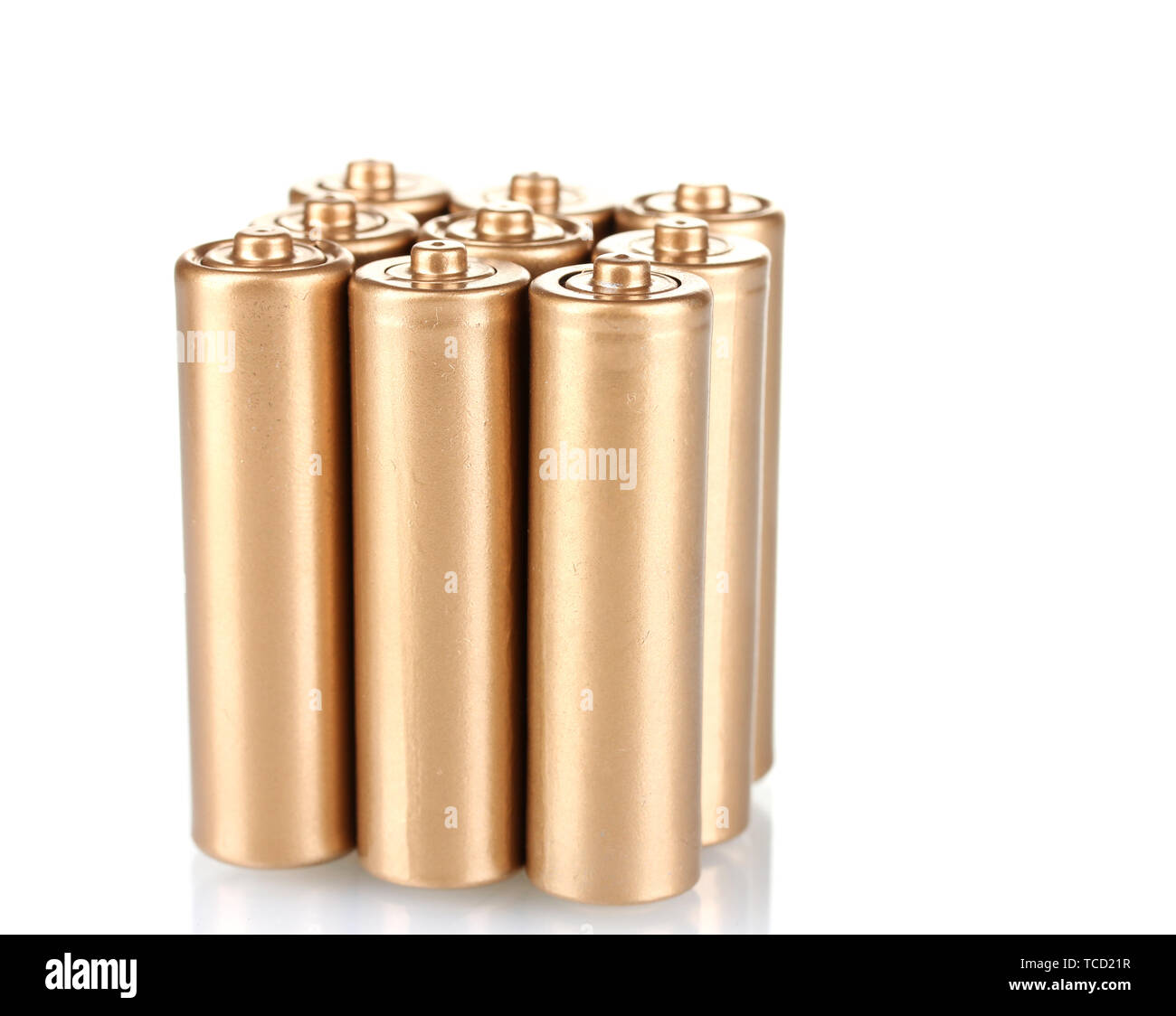 golden batteries isolated on white Stock Photo - Alamy