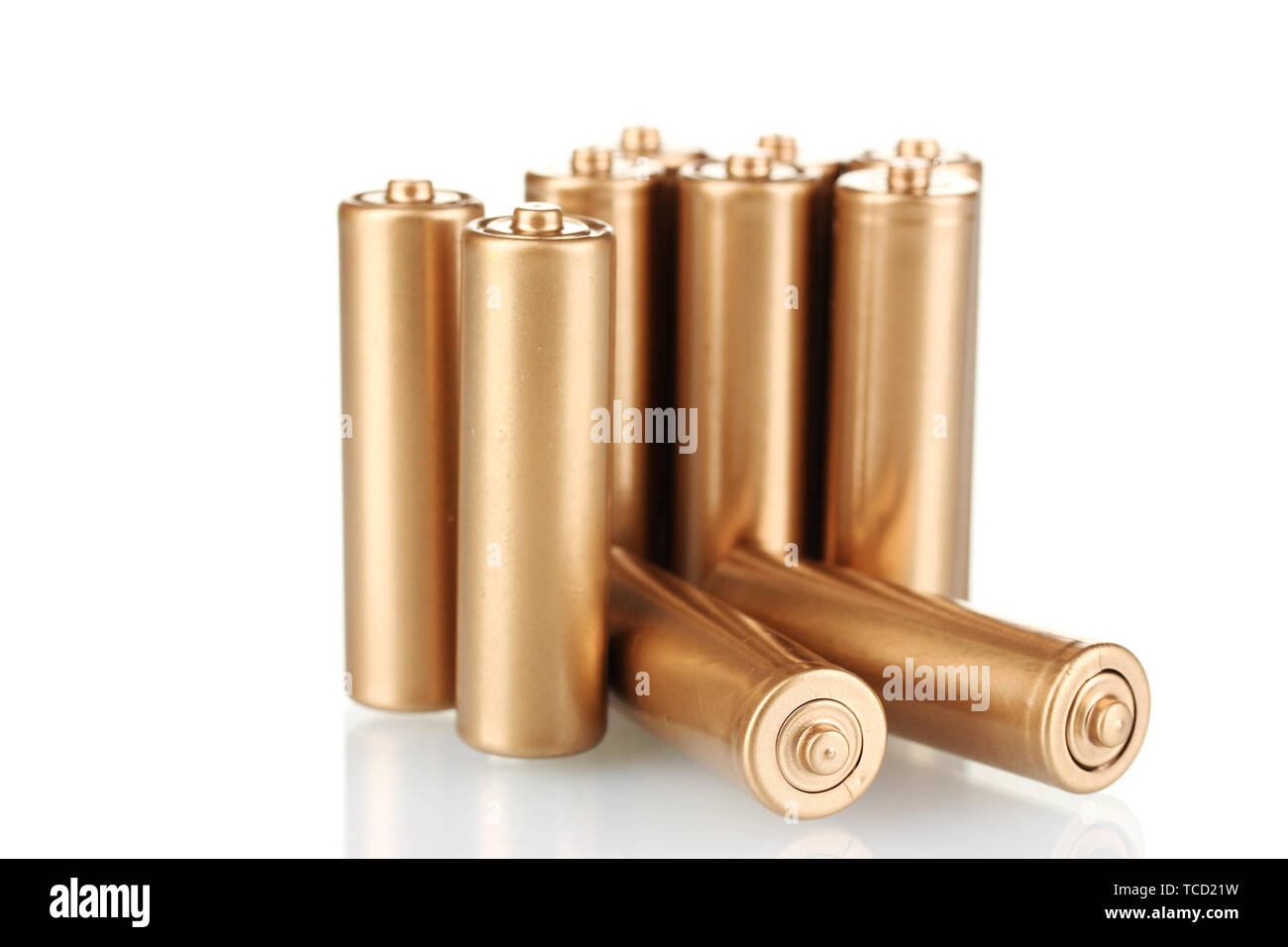 golden batteries isolated on white Stock Photo - Alamy