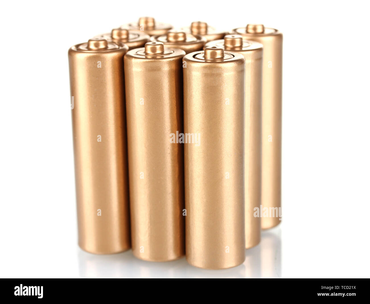 golden batteries isolated on white Stock Photo - Alamy