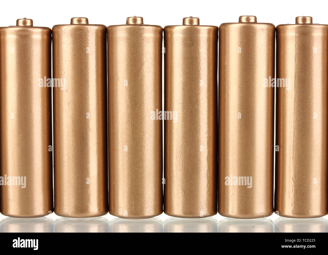 golden batteries isolated on white Stock Photo - Alamy