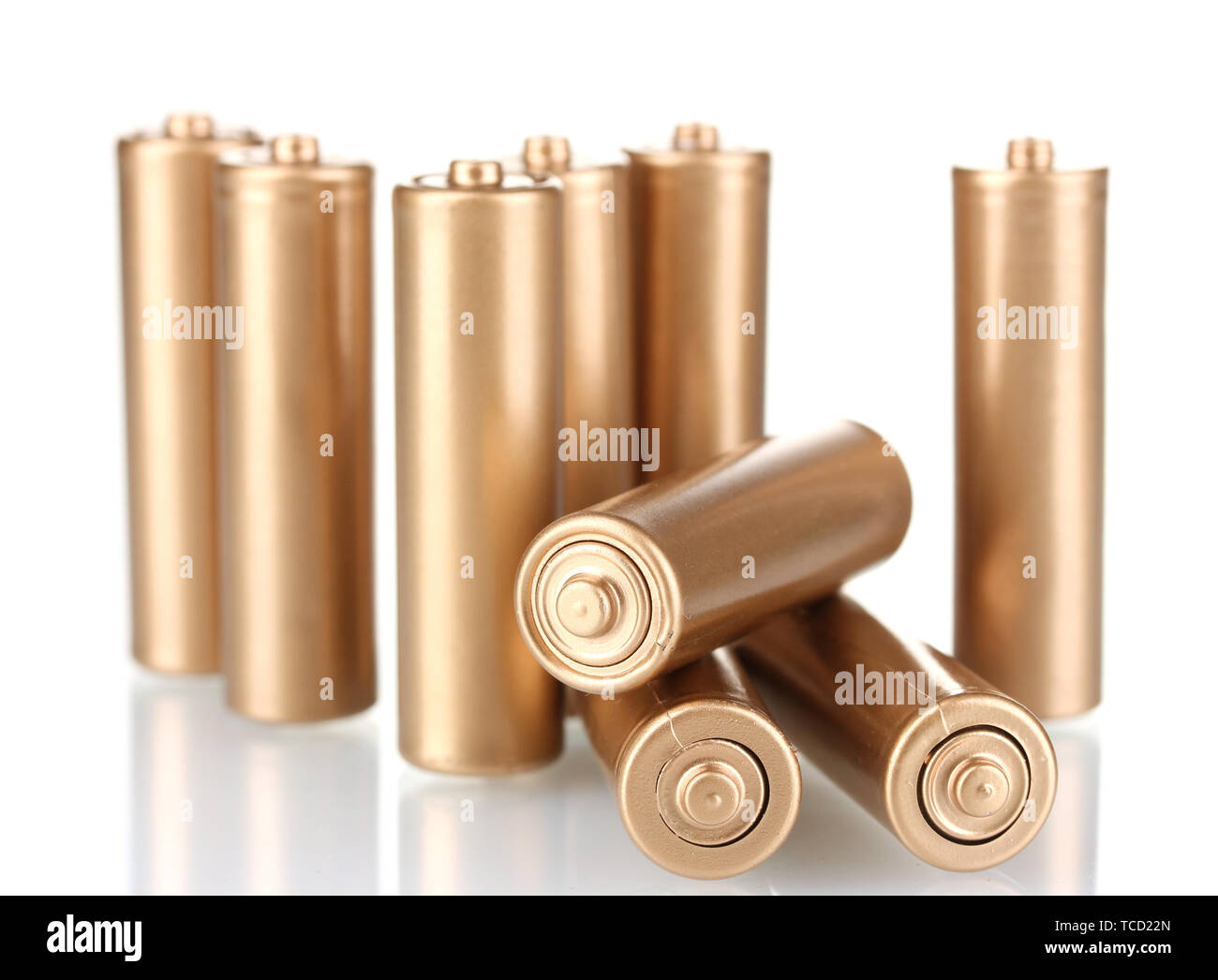 golden batteries isolated on white Stock Photo - Alamy