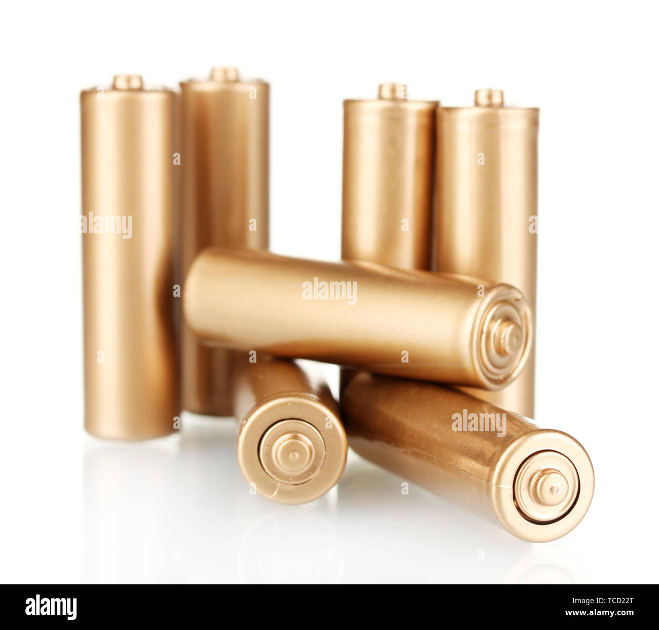 golden batteries isolated on white Stock Photo - Alamy
