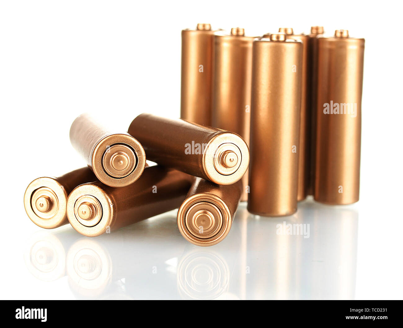 golden batteries isolated on white Stock Photo - Alamy