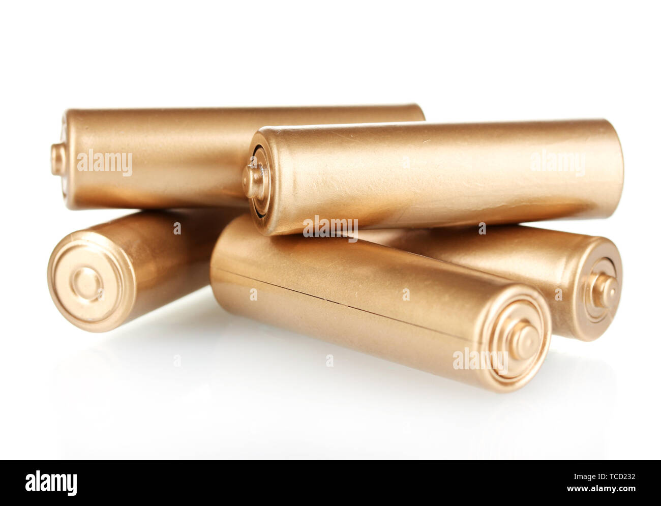golden batteries isolated on white Stock Photo - Alamy