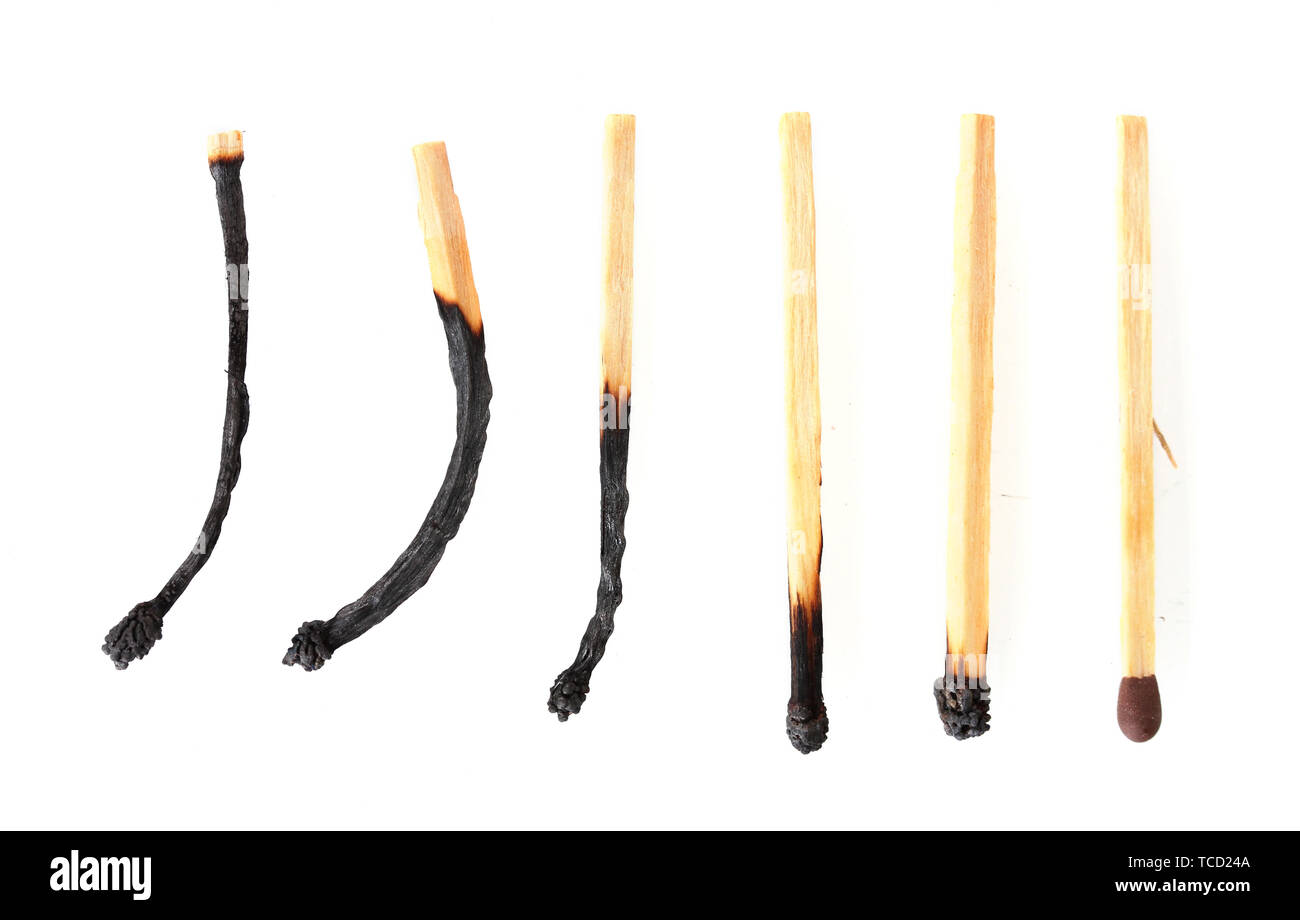 burnt matches and one whole match isolated on white Stock Photo - Alamy